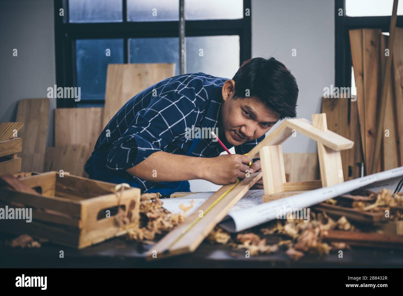 A carpenter's creativity and woodwork Stock Photo - Alamy