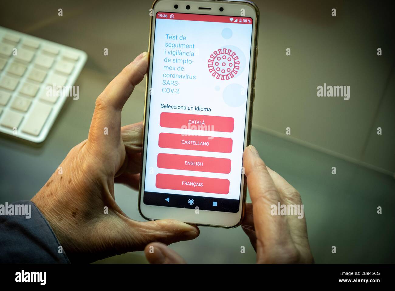 Barcelona, Spain. 19th Mar, 2020. In this photo illustration a mobile ...