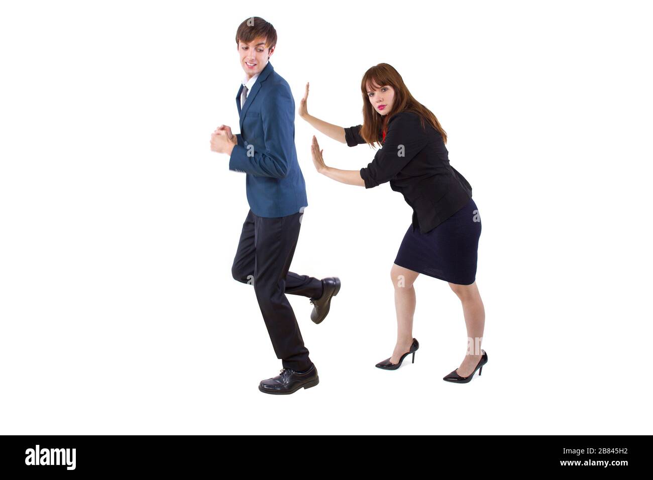 Woman pushing man away Cut Out Stock Images & Pictures - Alamy