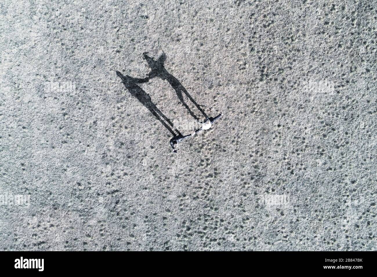 Shadow of couple people - man and woman holding hands and dancing on ...