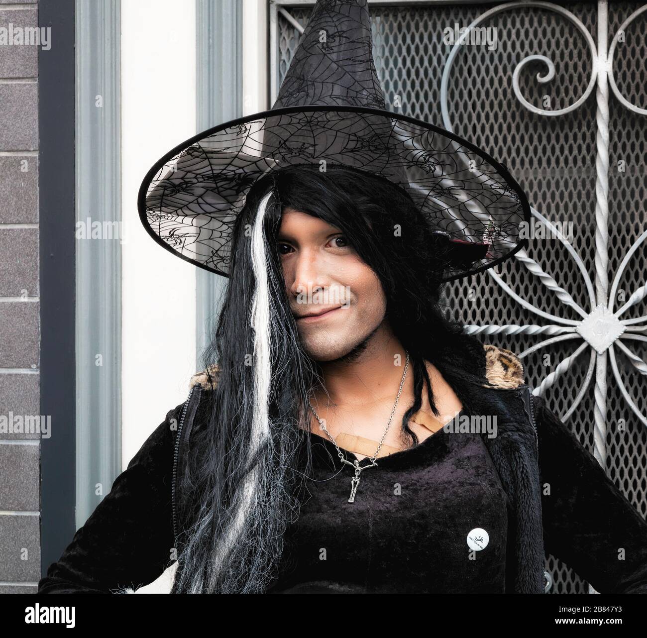 Man dressed in witch costume on Ashbury Street, Haight-Ashbury district ...