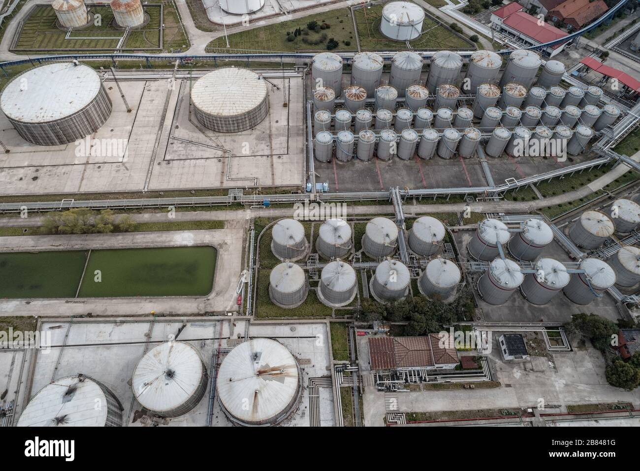 Aerial view of the pipelines and storage tanks Stock Photo - Alamy