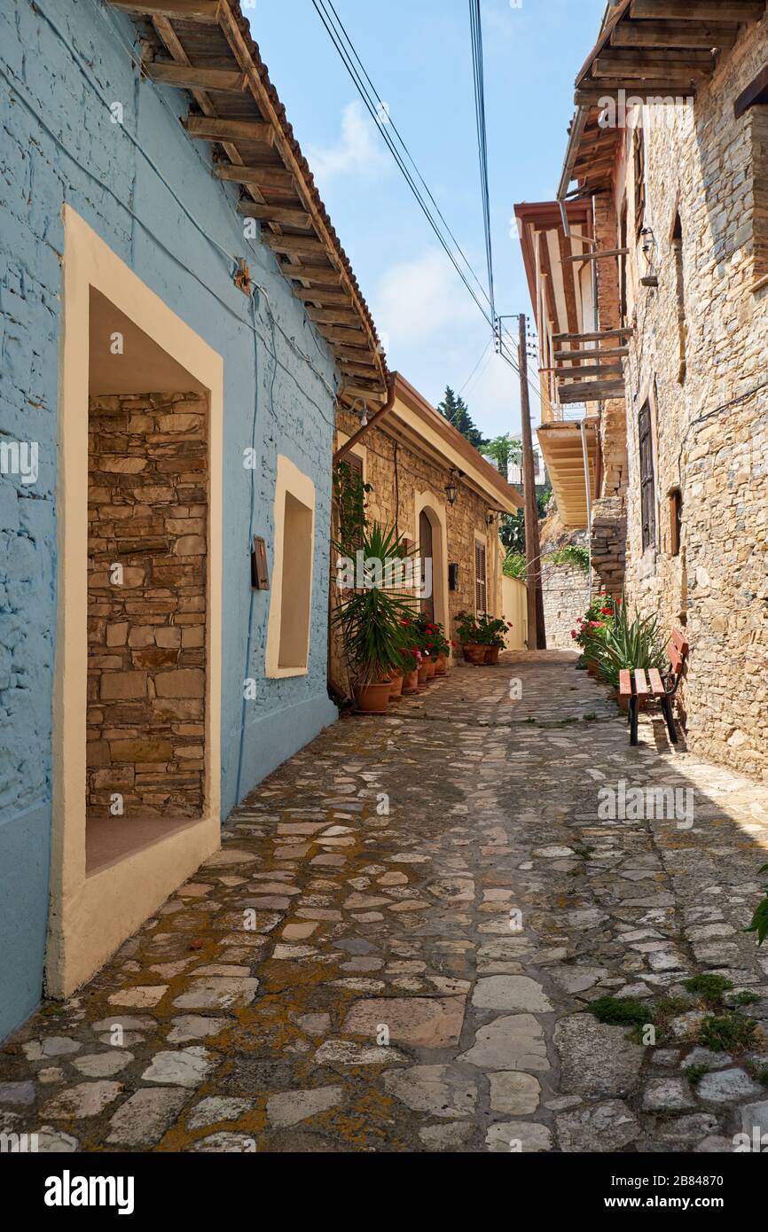 The traditional paved narrow limestone streets of Pano Lefkara village ...