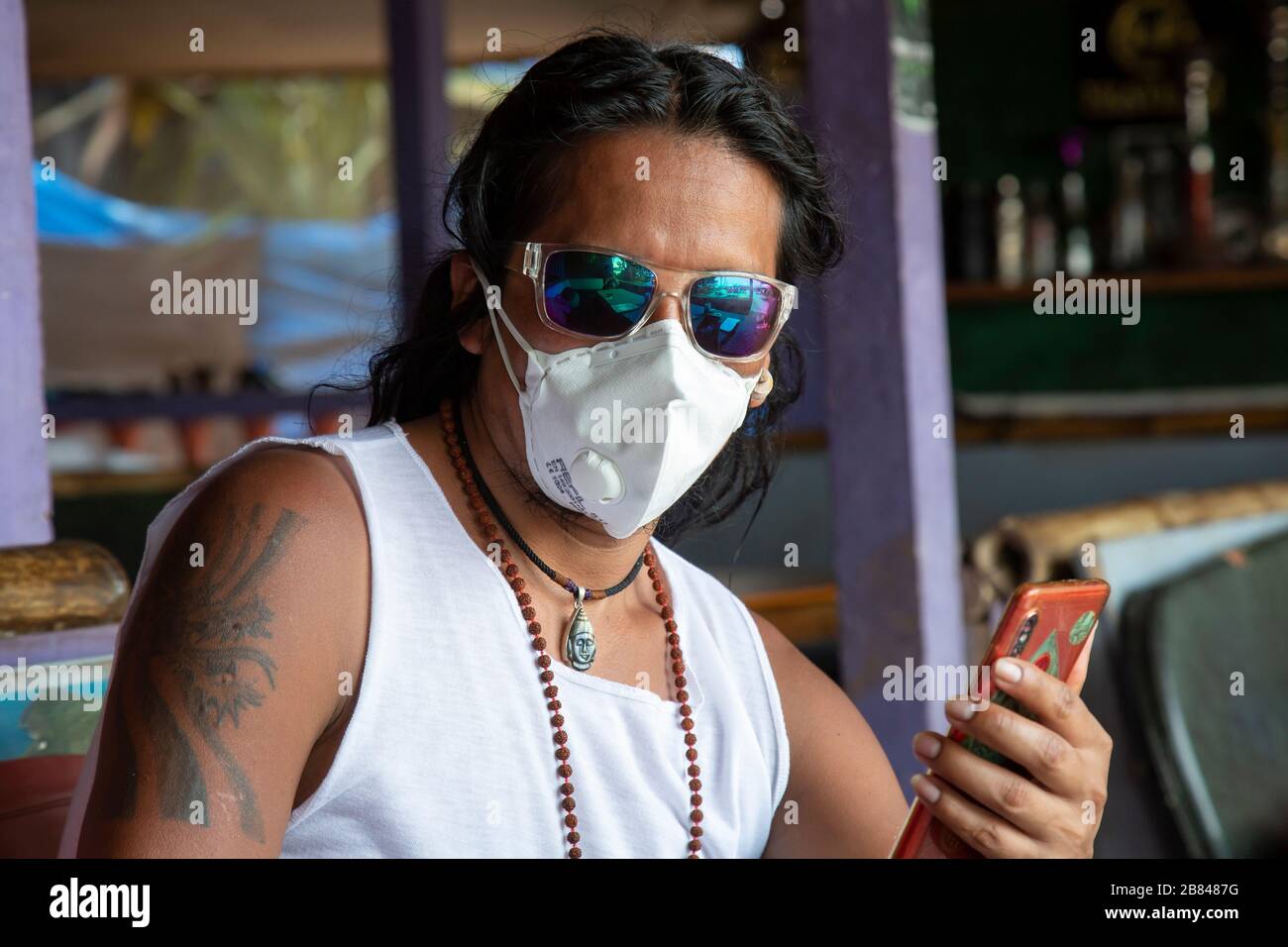 Portrait of man with veil sitting in the restaurant Stock Photo - Alamy