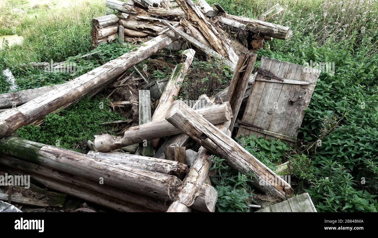 Very old North wintering log cabin collapsed. In such small dwellings ...