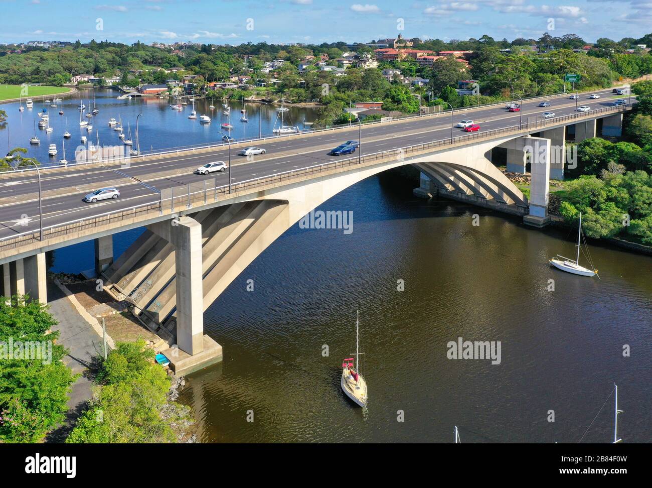 bridge over creek Stock Photo - Alamy