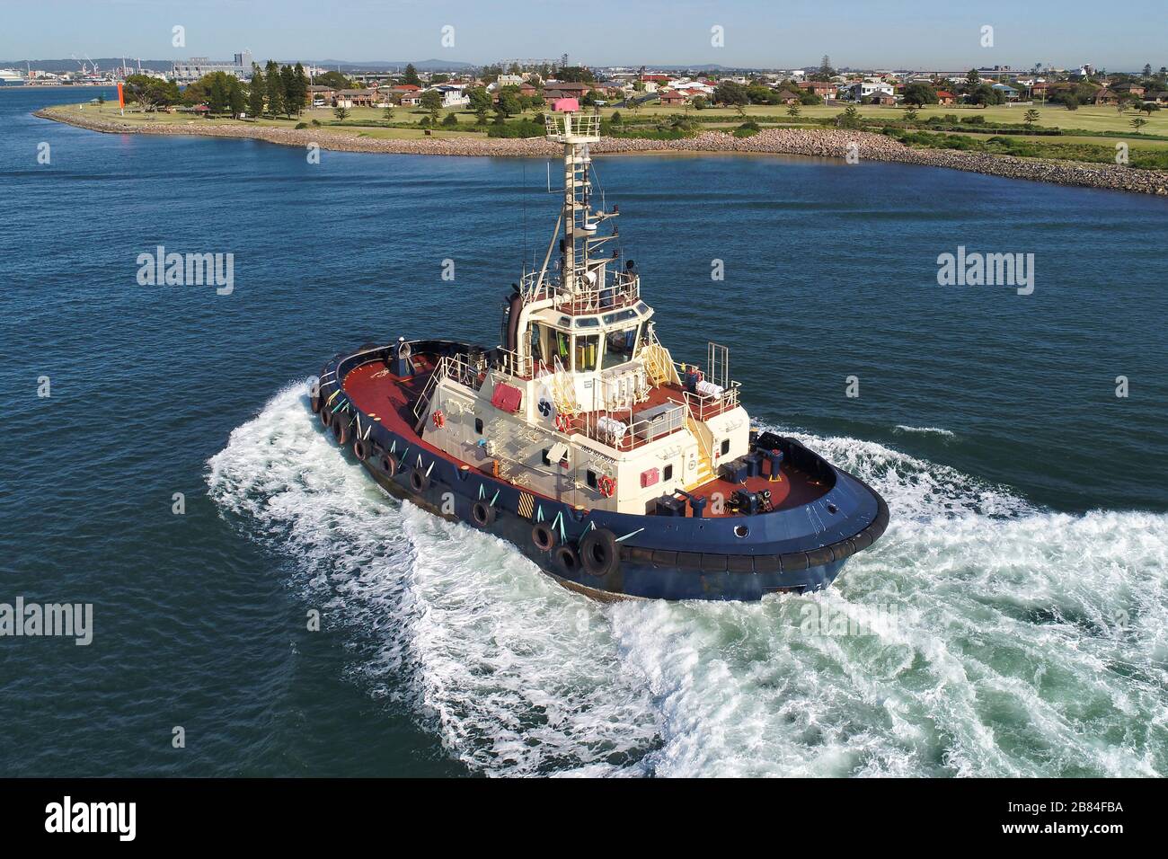tug boat on harbour Stock Photo - Alamy