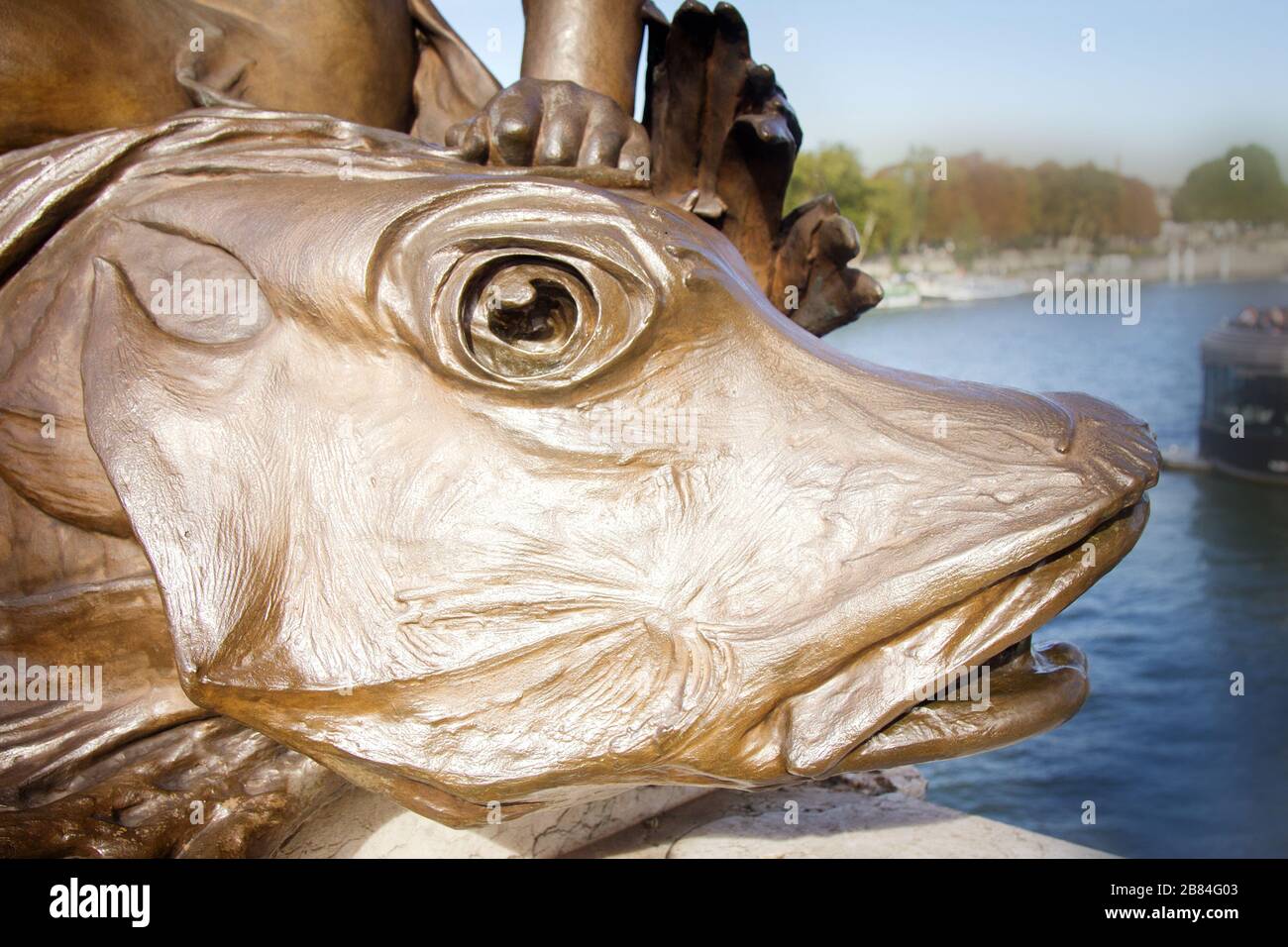 France, Paris. Pike's muzzle as part of monument. Straddling fish whale ...