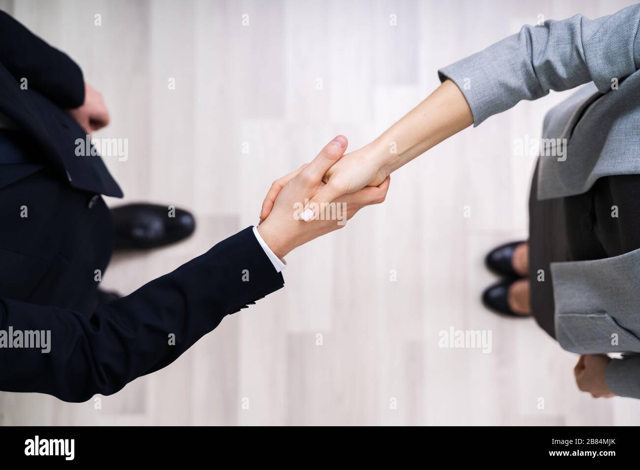 Top view people shake hands hi-res stock photography and images - Alamy