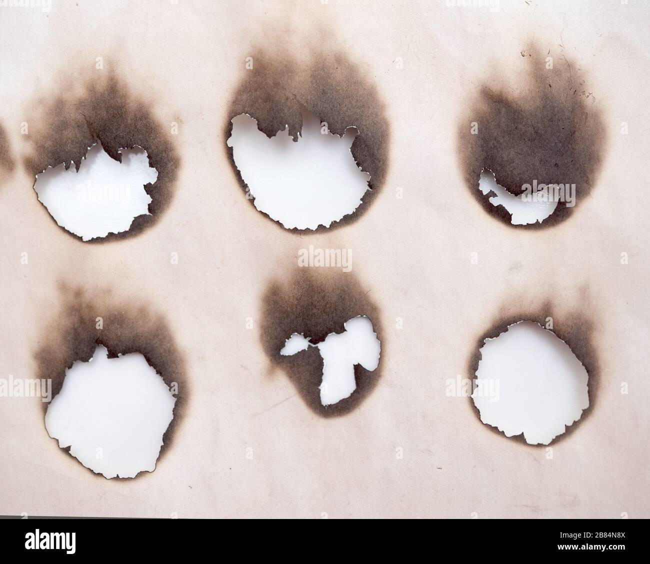 Torn paper burn collage hi-res stock photography and images - Alamy