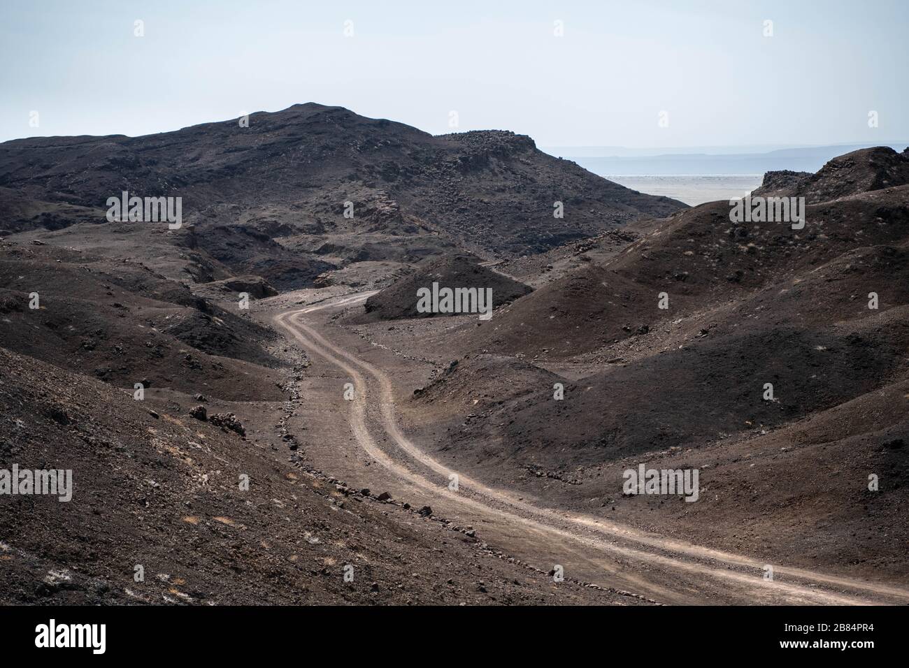 Africa, Djibouti, Lake Abbe. pathway leading to lake Abbe Stock Photo ...
