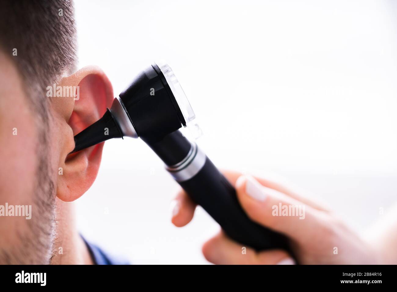 Close-up Of A Female Doctor Examining Patient's Ear With Otoscope Stock ...