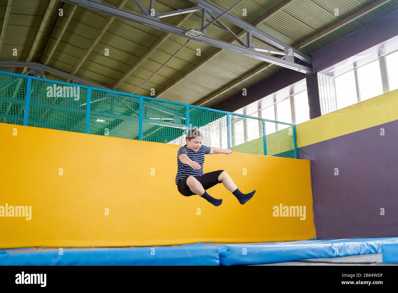 Fat Asian Kid Jumping