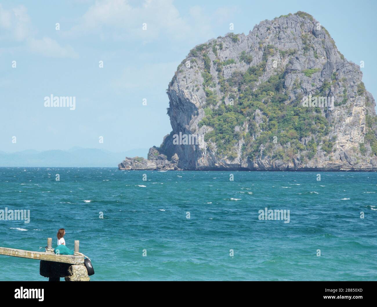 Ko Ngai Hai Island ocean peer view with person Stock Photo - Alamy