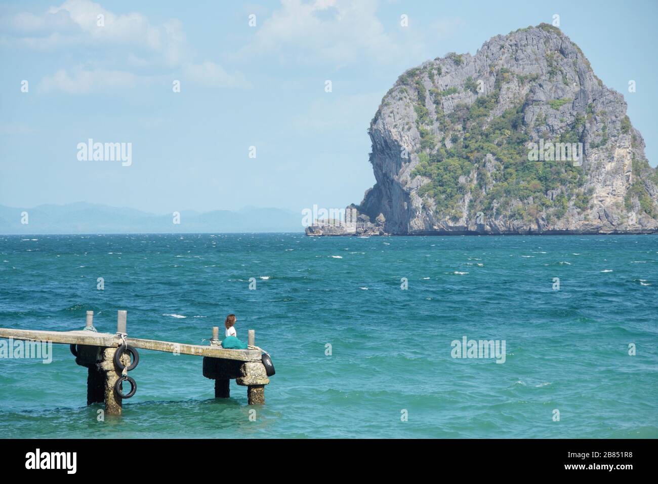 Ko Ngai Hai Island ocean peer view with person Stock Photo - Alamy