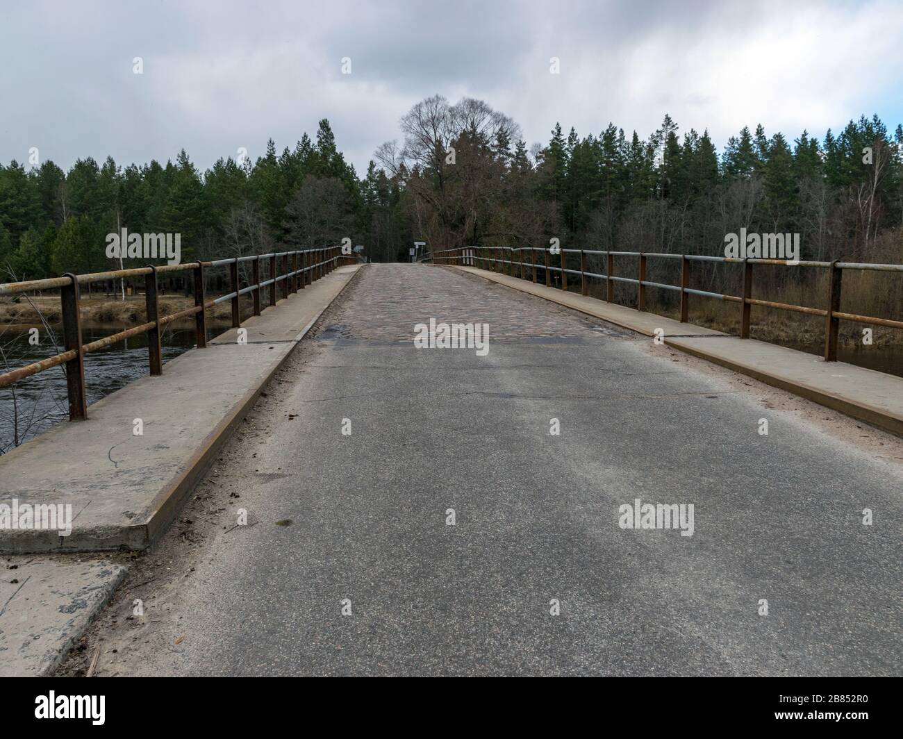 bridge cover, old stone pavement, close-up view, blurred background ...