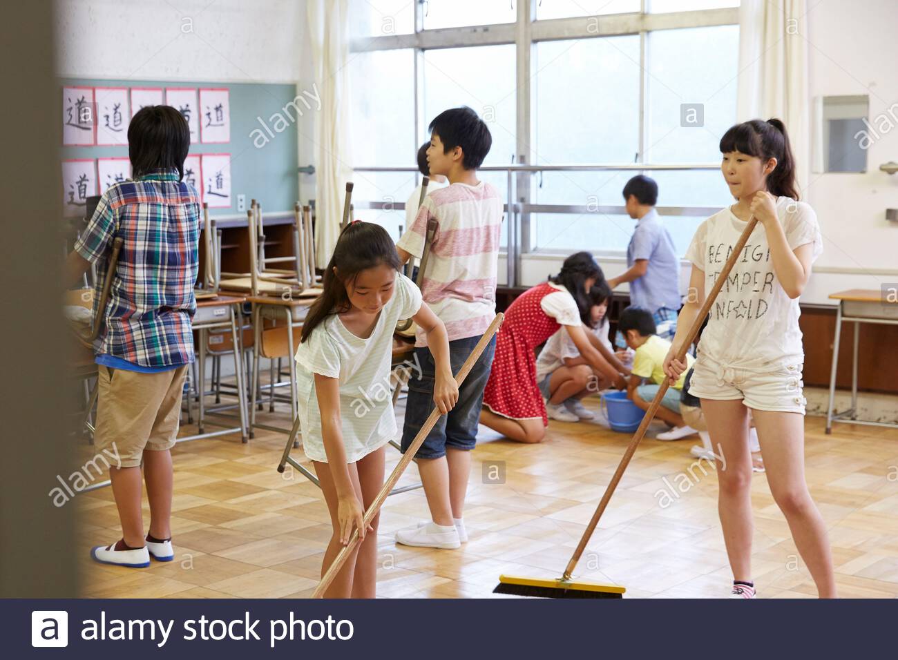Student Cleaning Classroom High Resolution Stock Photography and Images ...