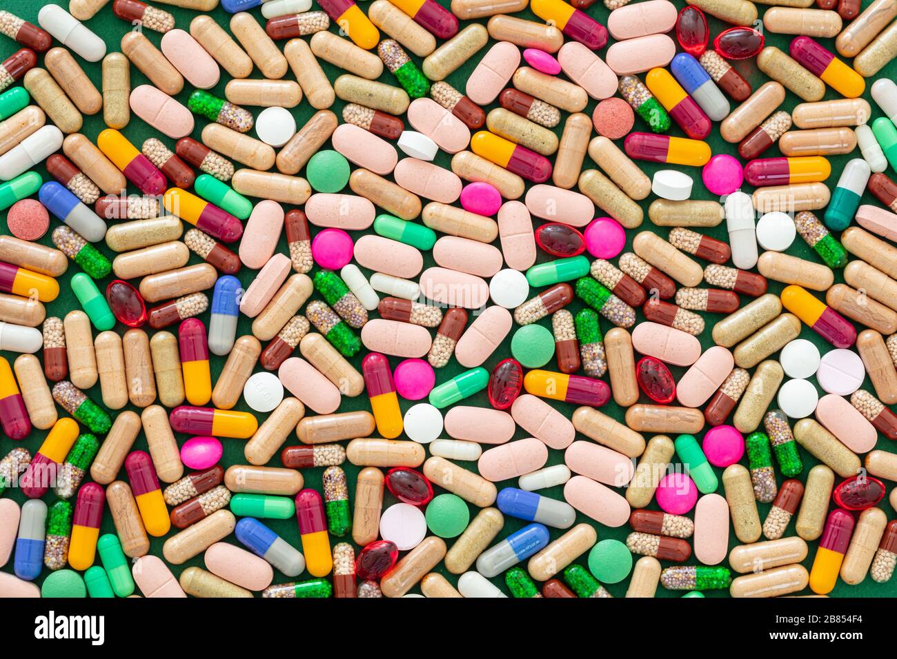 Medicine pills, tablets and capsules background, texture. Colorful ...