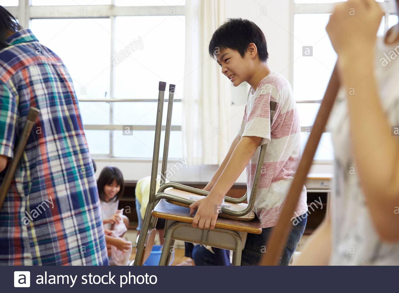 Student Cleaning Classroom High Resolution Stock Photography and Images ...