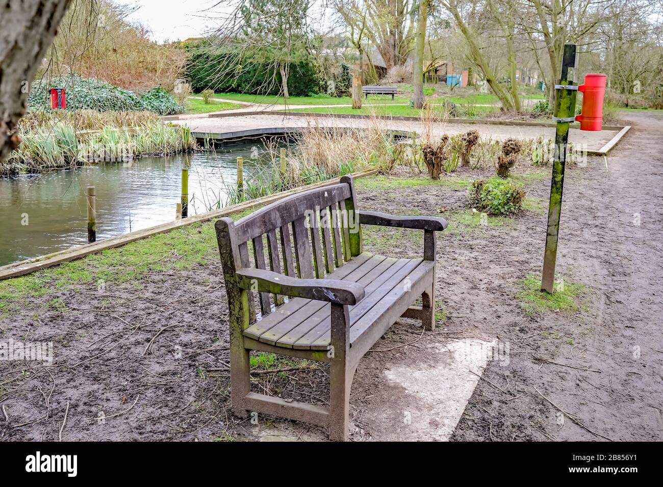 32 Wooden bench in public park in the village of Hoveton and Wroxham ...