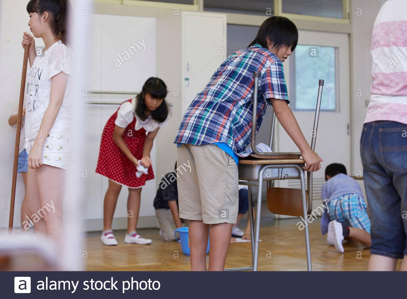 Student Cleaning Classroom High Resolution Stock Photography and Images ...