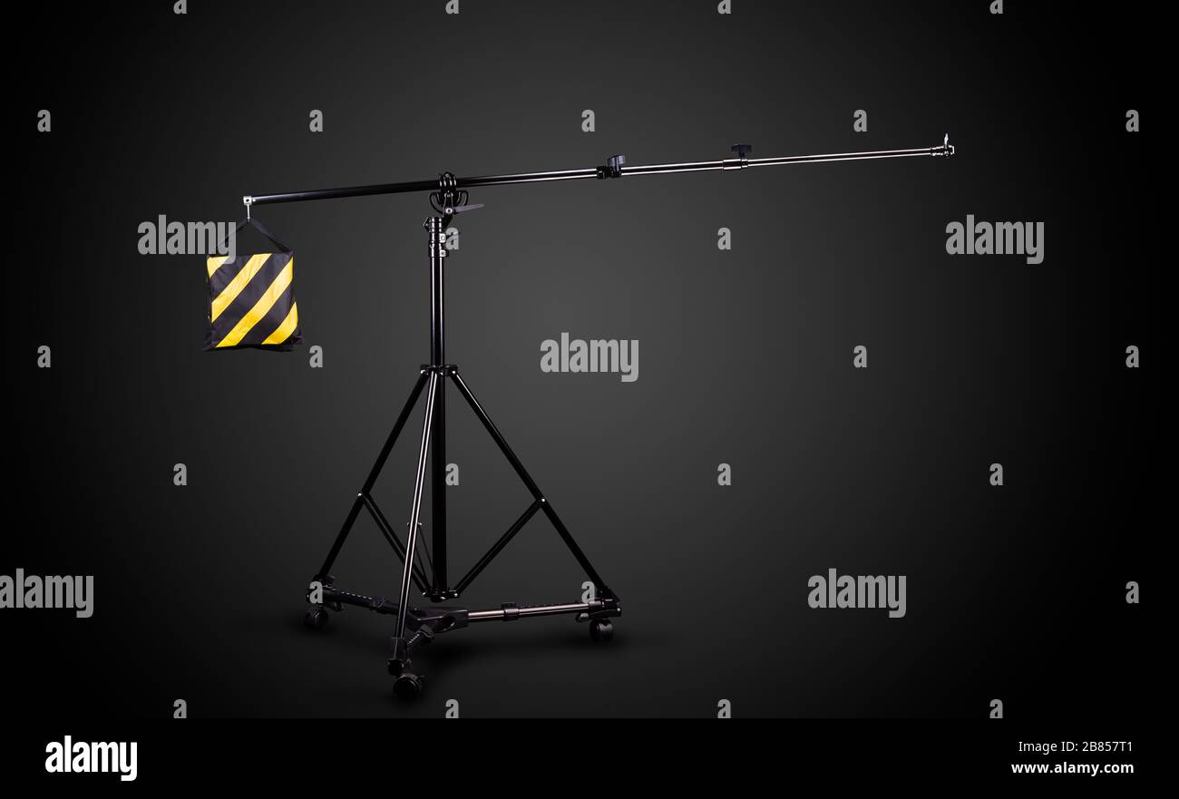 Photo studio lighting stands isolated on the black background Stock ...