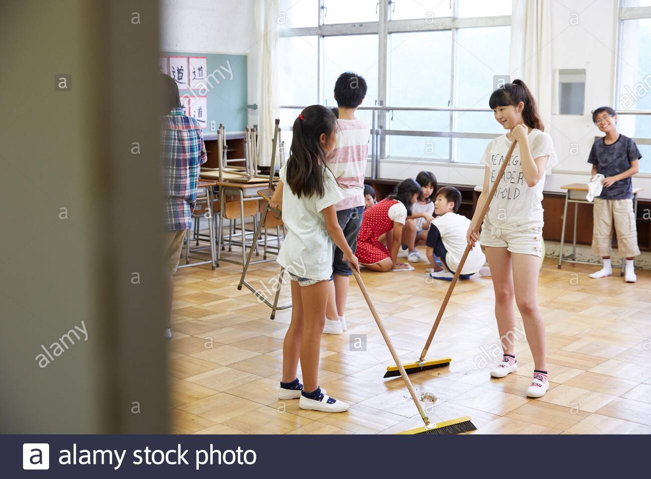 Student Cleaning Classroom High Resolution Stock Photography and Images ...