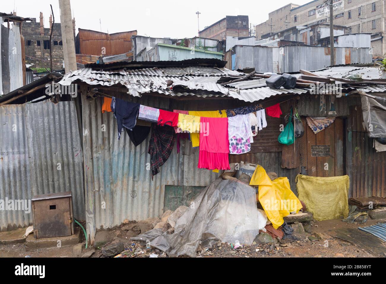 Washing hanging out, a corrugated iron shack, Mathare, Nairobi, Kenya ...