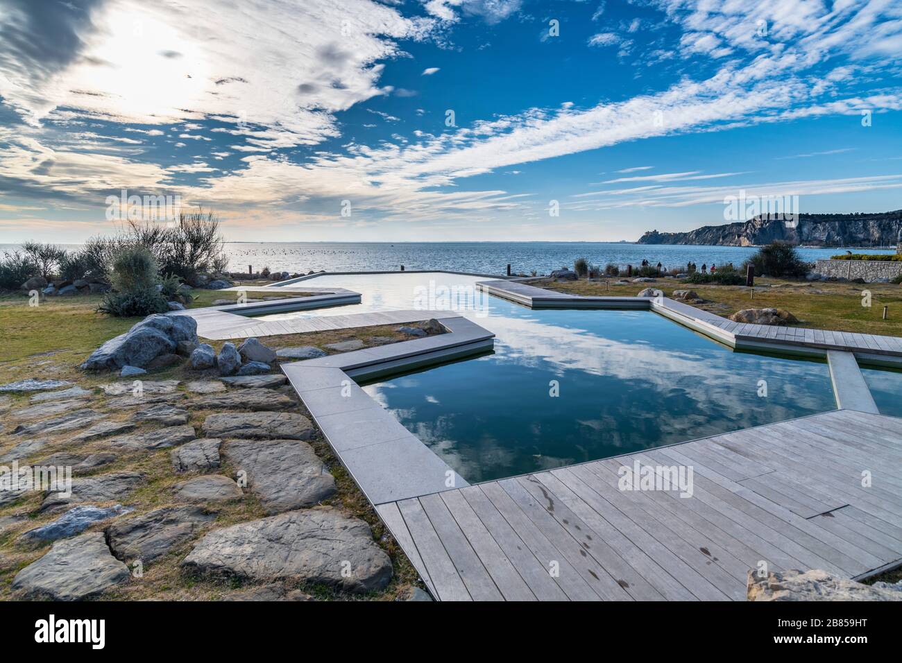 Winter sunset over the bay of Portopiccolo Sistiana. Duino. Italy Stock ...