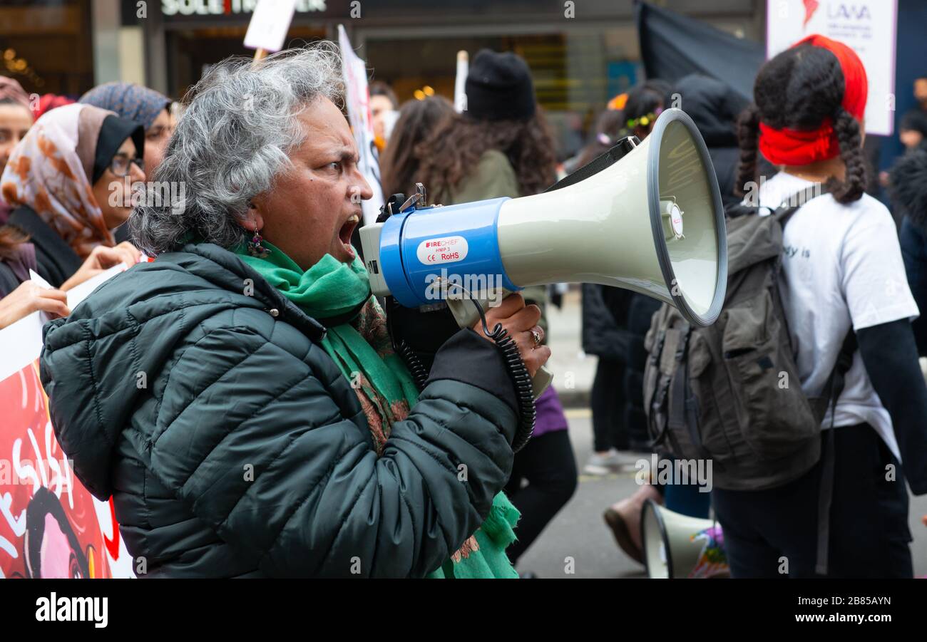 Female protesters with banners at the Million Women Rise demonstration ...