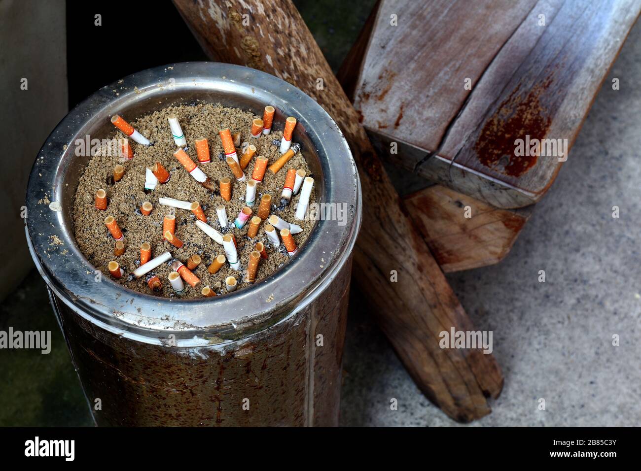 Ashtray bin trash and dirt, Ashtray at smoke area Stock Photo - Alamy