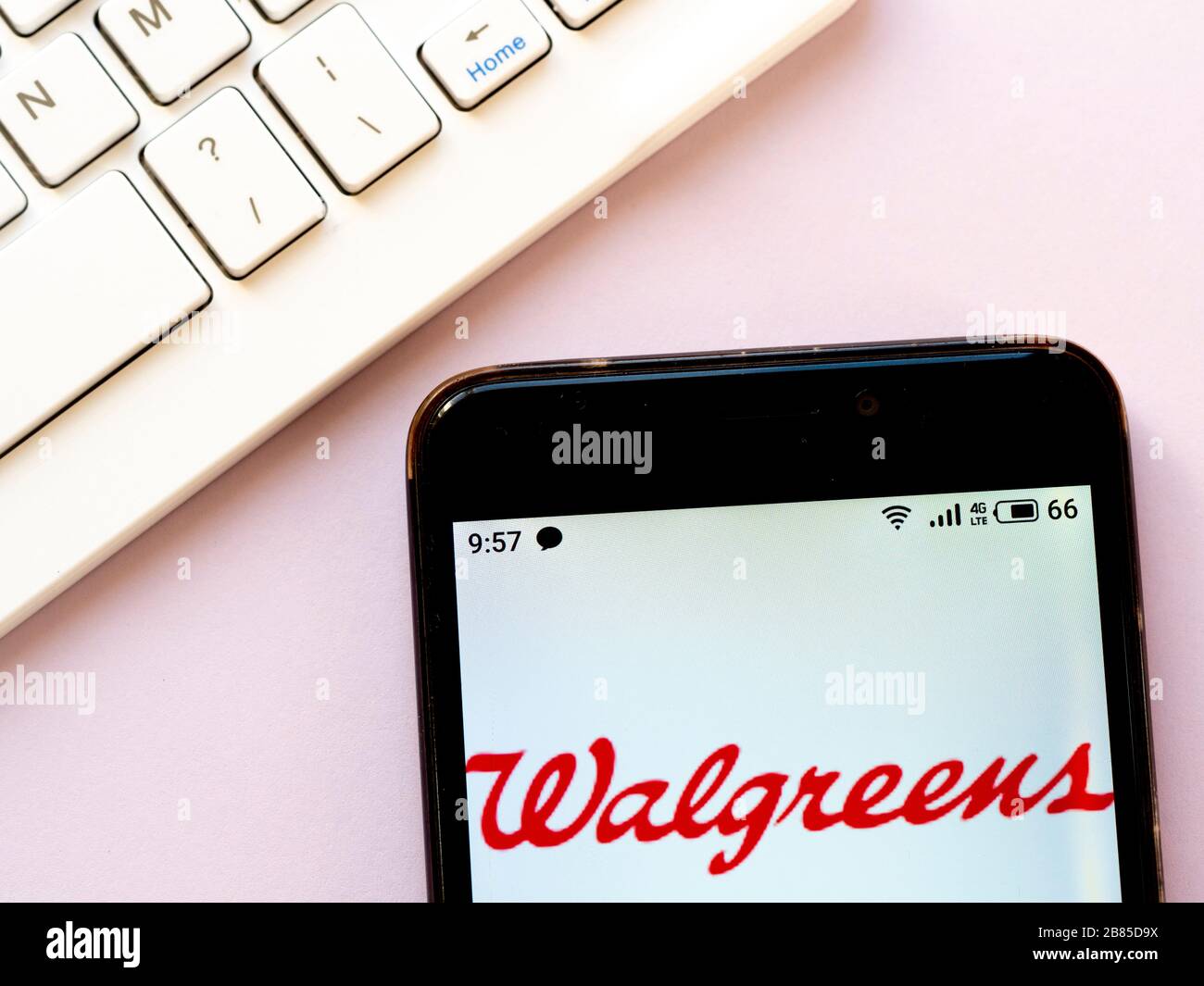 In this photo illustration Walgreens logo is seen displayed on a ...