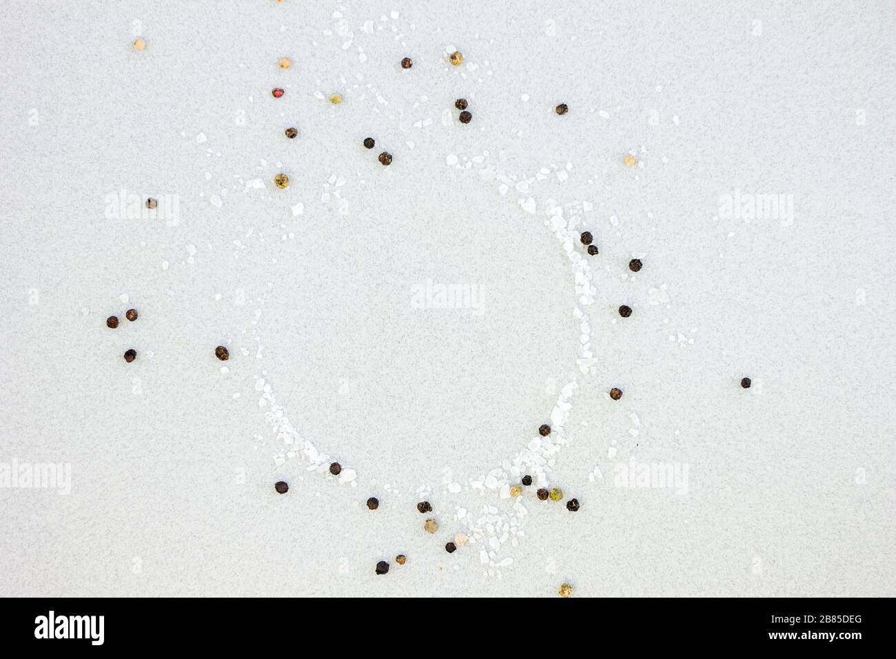 Spices and sea salt over grey background Stock Photo - Alamy