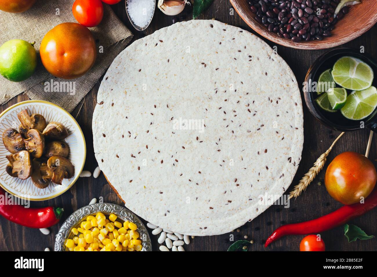 Mexican food - tortilla with vegetables, corn and beans Stock Photo - Alamy