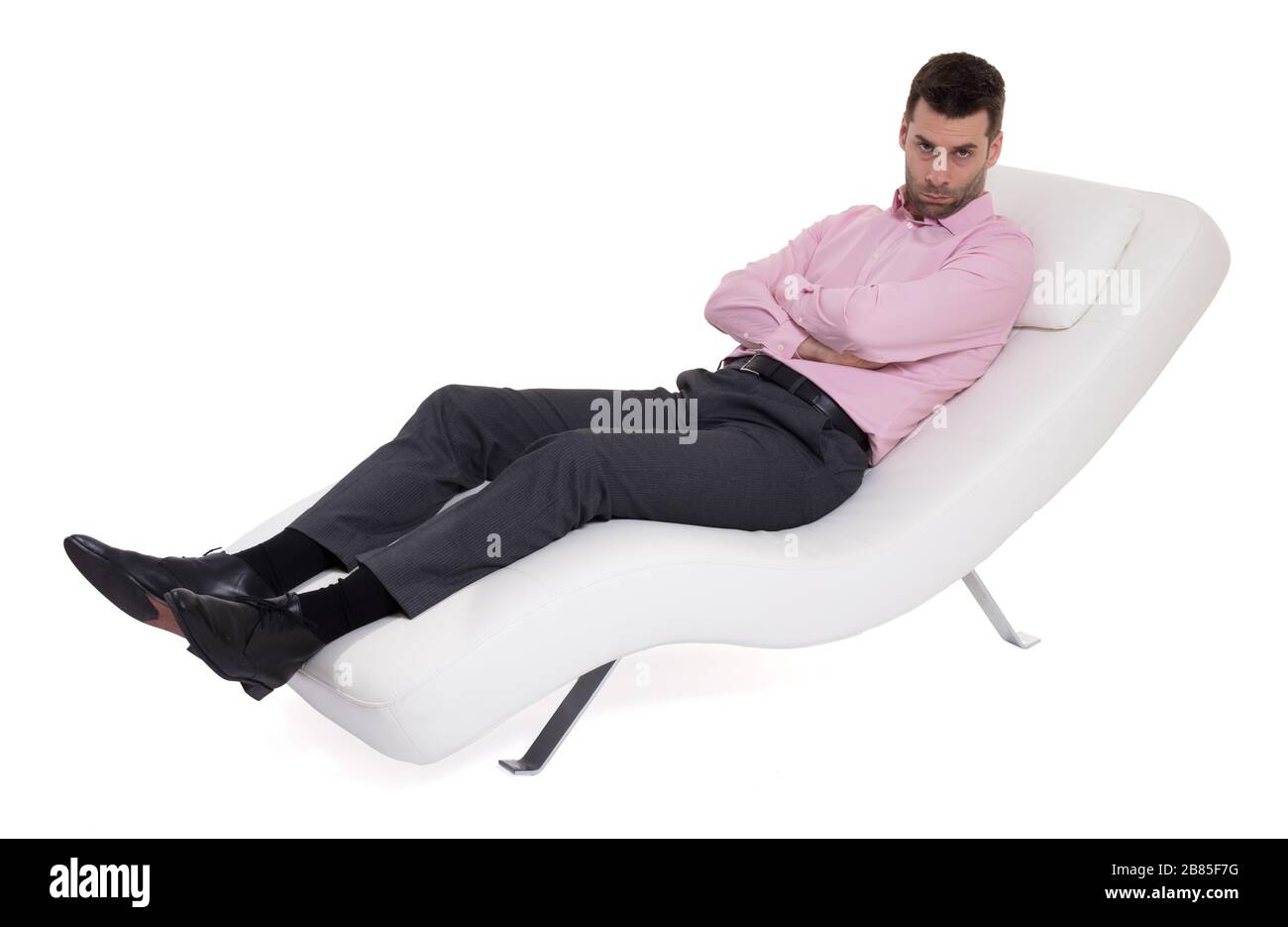 Man client sitting with psychologist on the comfortable couch during ...