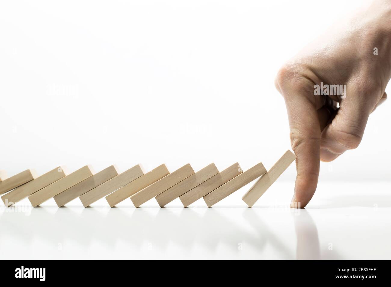 Dominos falling hi-res stock photography and images - Alamy