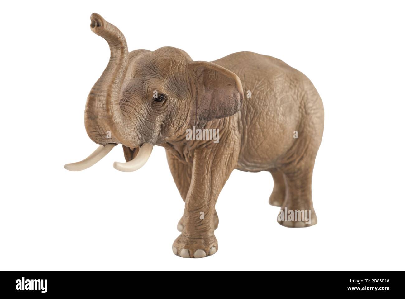 Toy elephant isolated on white. Grey toy plastic rubber elephant with ...