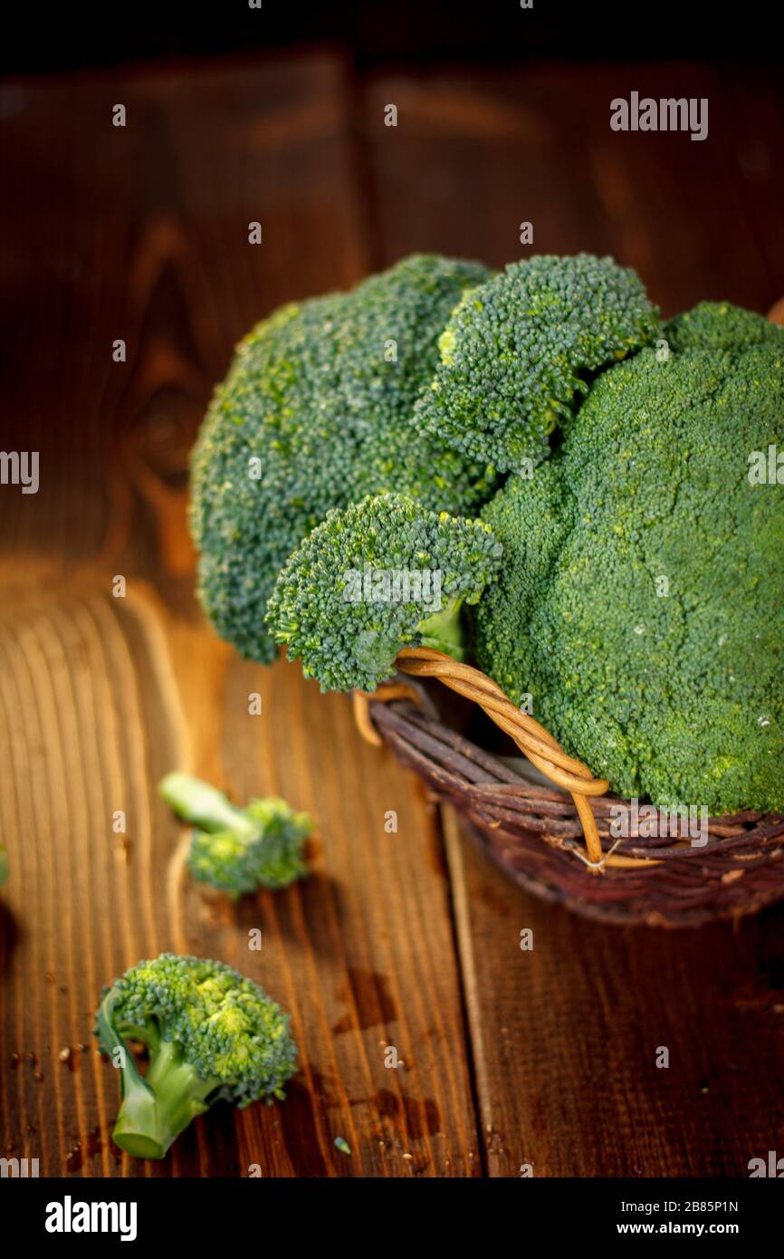 Beautiful green broccoli in a natural basket Stock Photo - Alamy