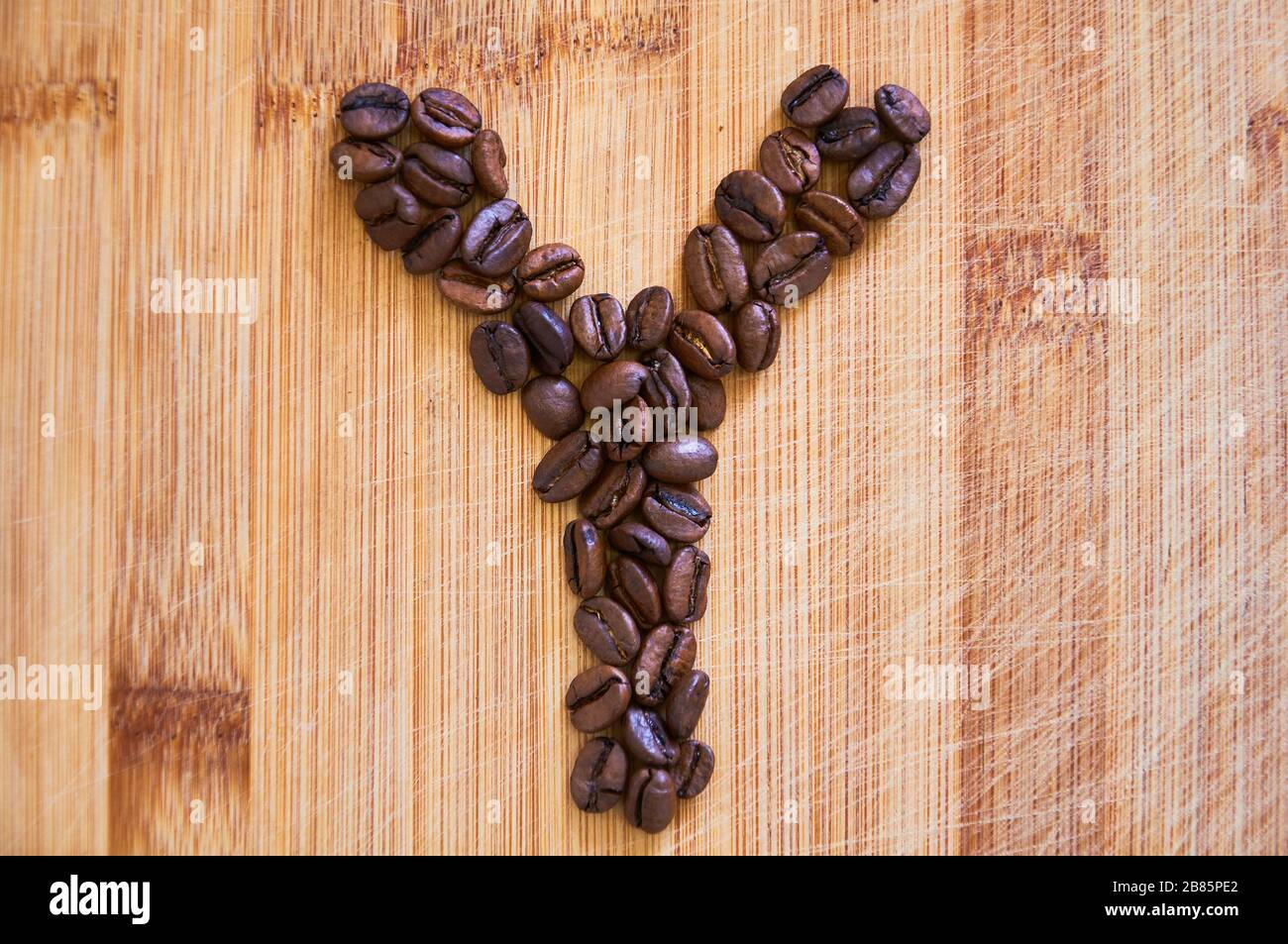 Alphabet letter Y made from roasted coffee beans, 3D rendering on ...