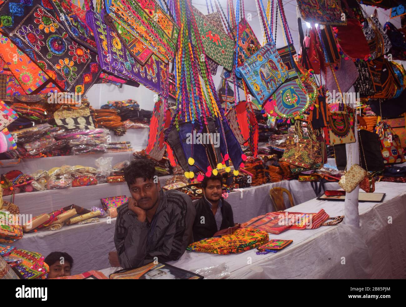 Indian shopkeepers displaying Handicraft bags at Shantiniketan poush ...