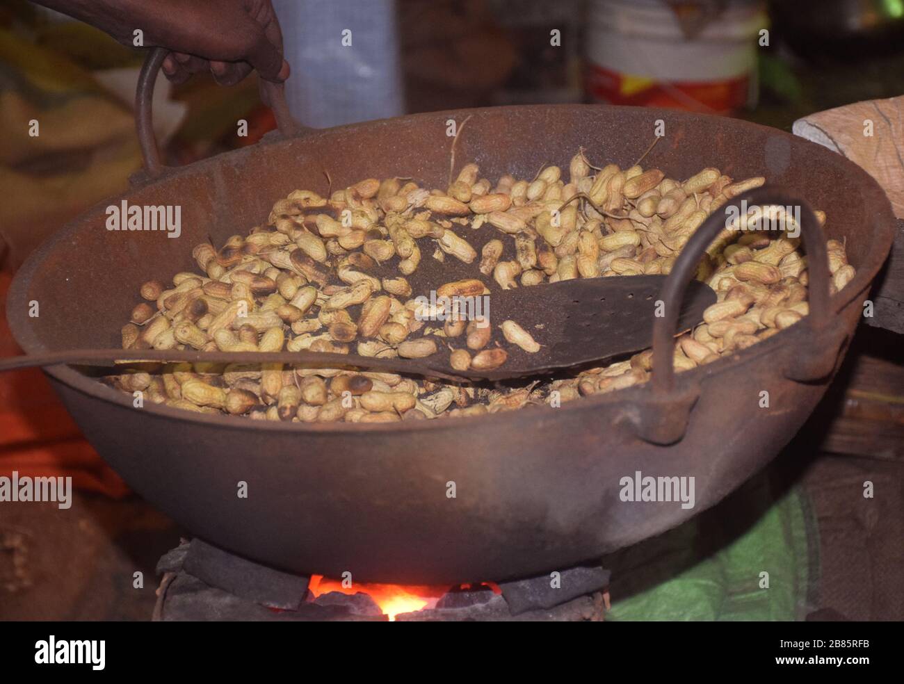 Peanut Roasting in progress in an Indian Market also called as ...