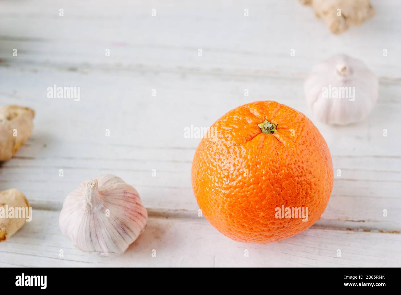 citrus fruits with garlic and ginger root Stock Photo - Alamy