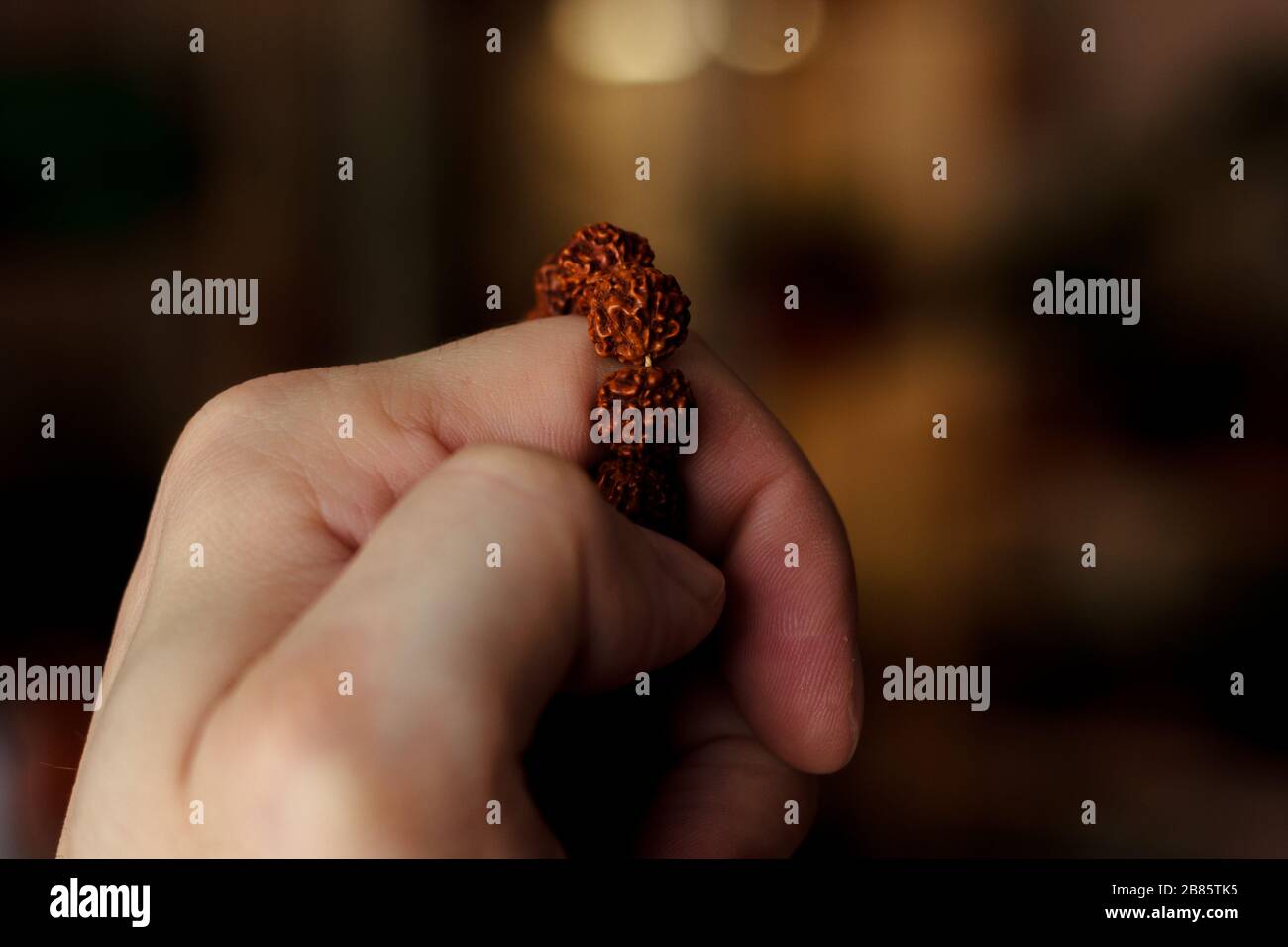 Hand and rudraksha beads hi-res stock photography and images - Alamy