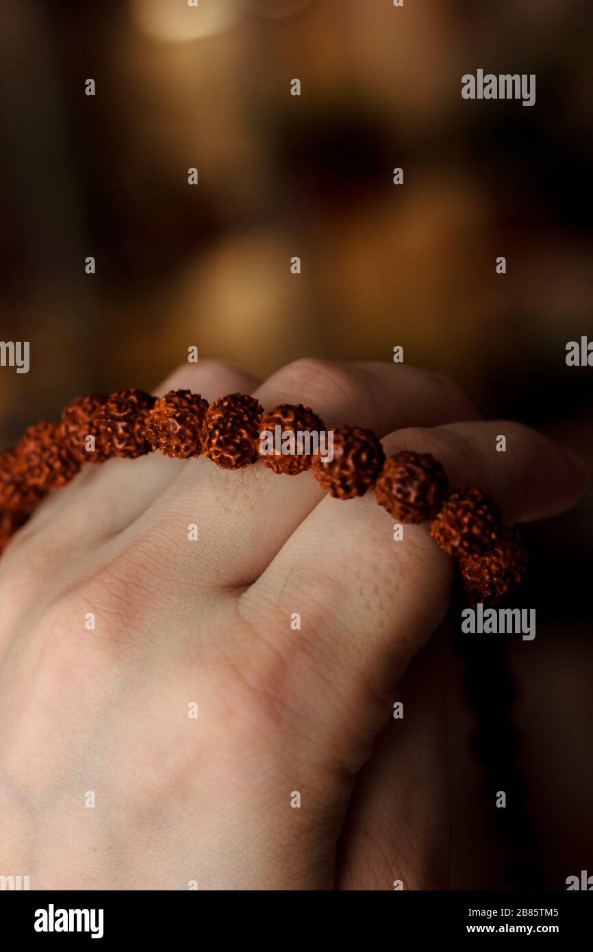 Hand and rudraksha beads hi-res stock photography and images - Alamy
