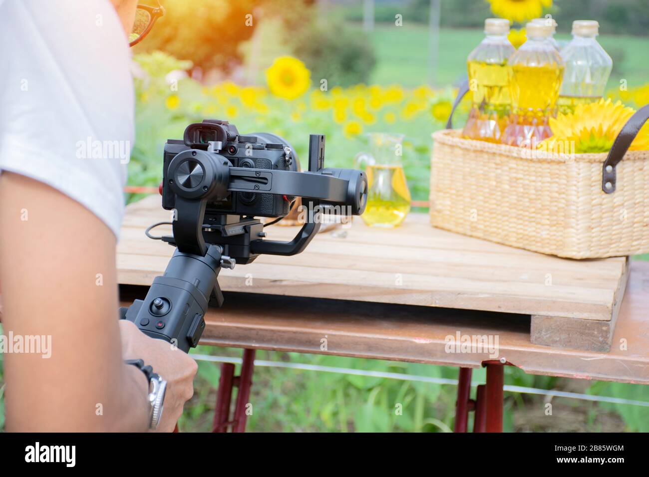 photographer Control the camera to not shake, moving along the hand ...