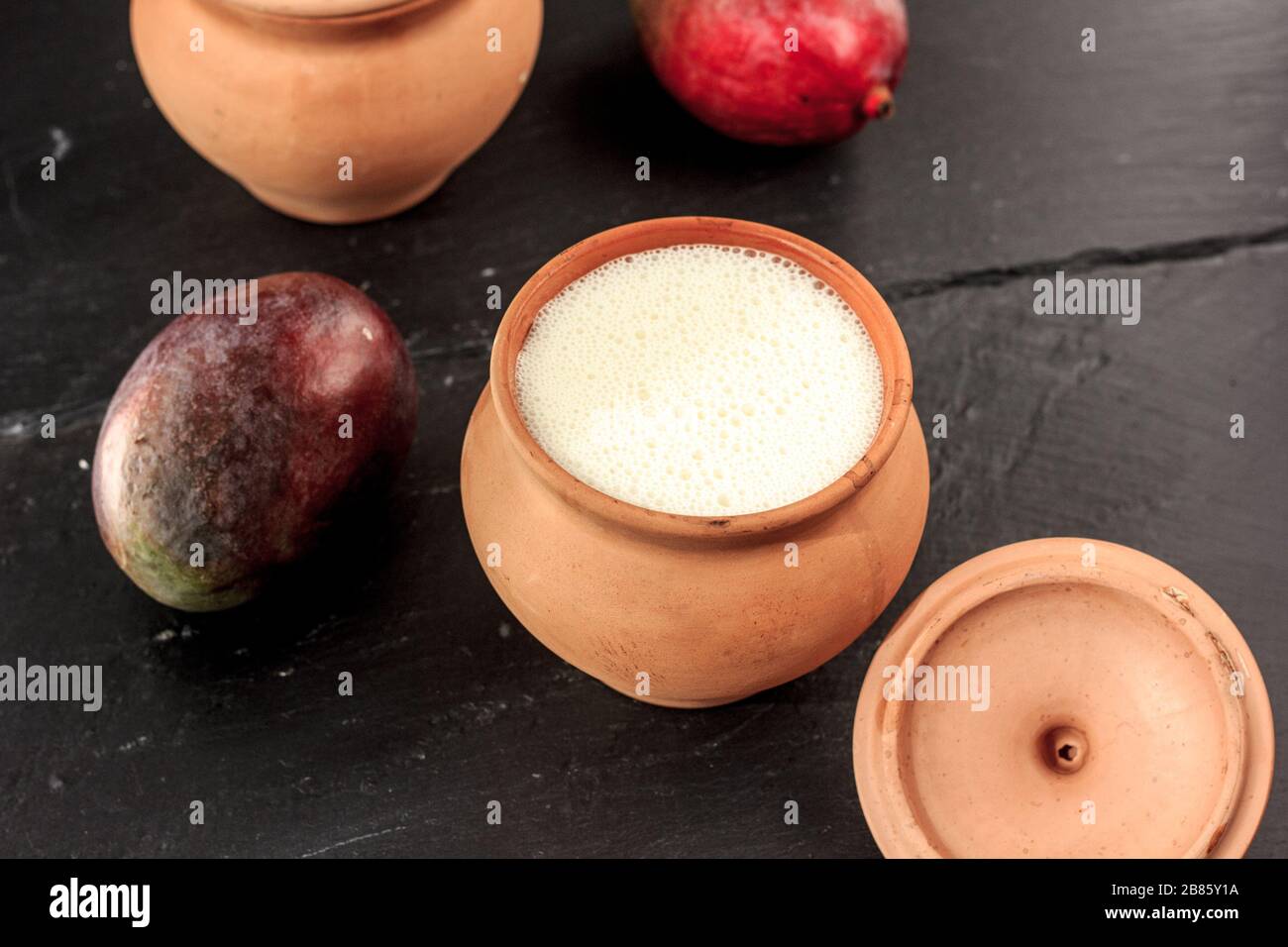 Fresh lassi in traditional indian clay pot Stock Photo - Alamy