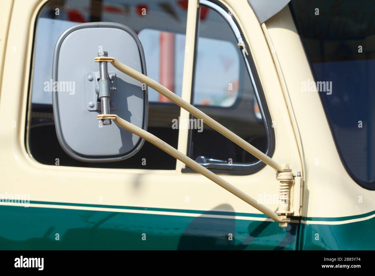 Car window with rear view mirror, vintage Sirius Rundhauber truck built ...