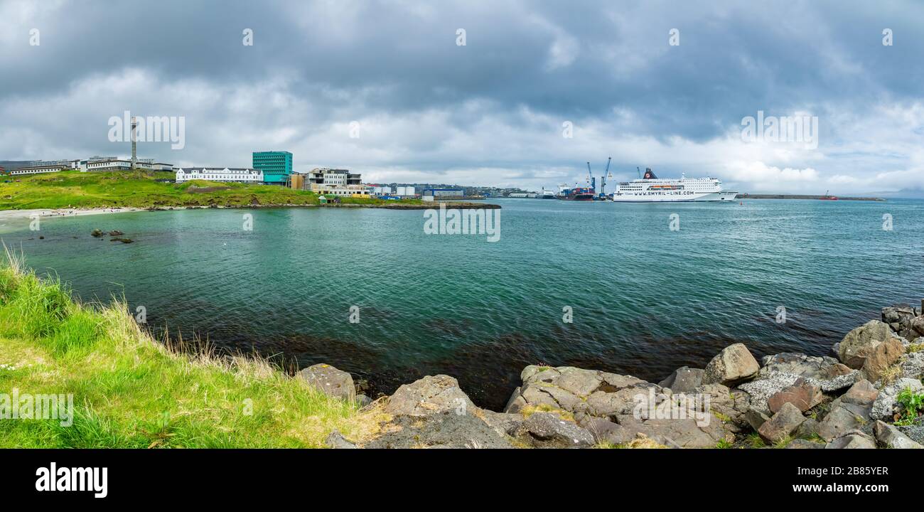 Torshavn port with cruiser and container ship Stock Photo - Alamy