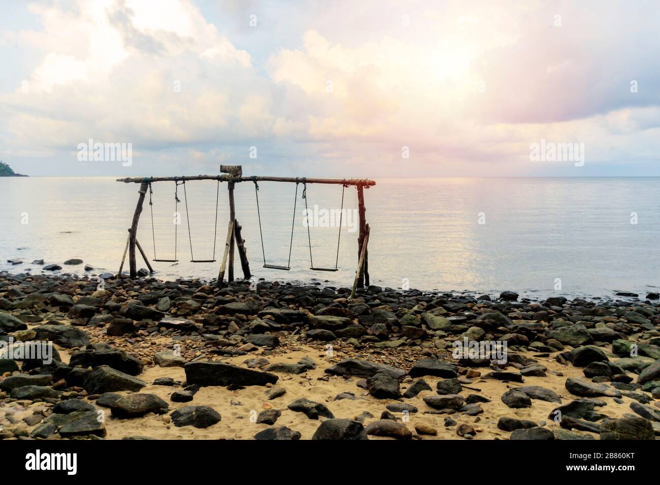 Swings over water hi-res stock photography and images - Alamy