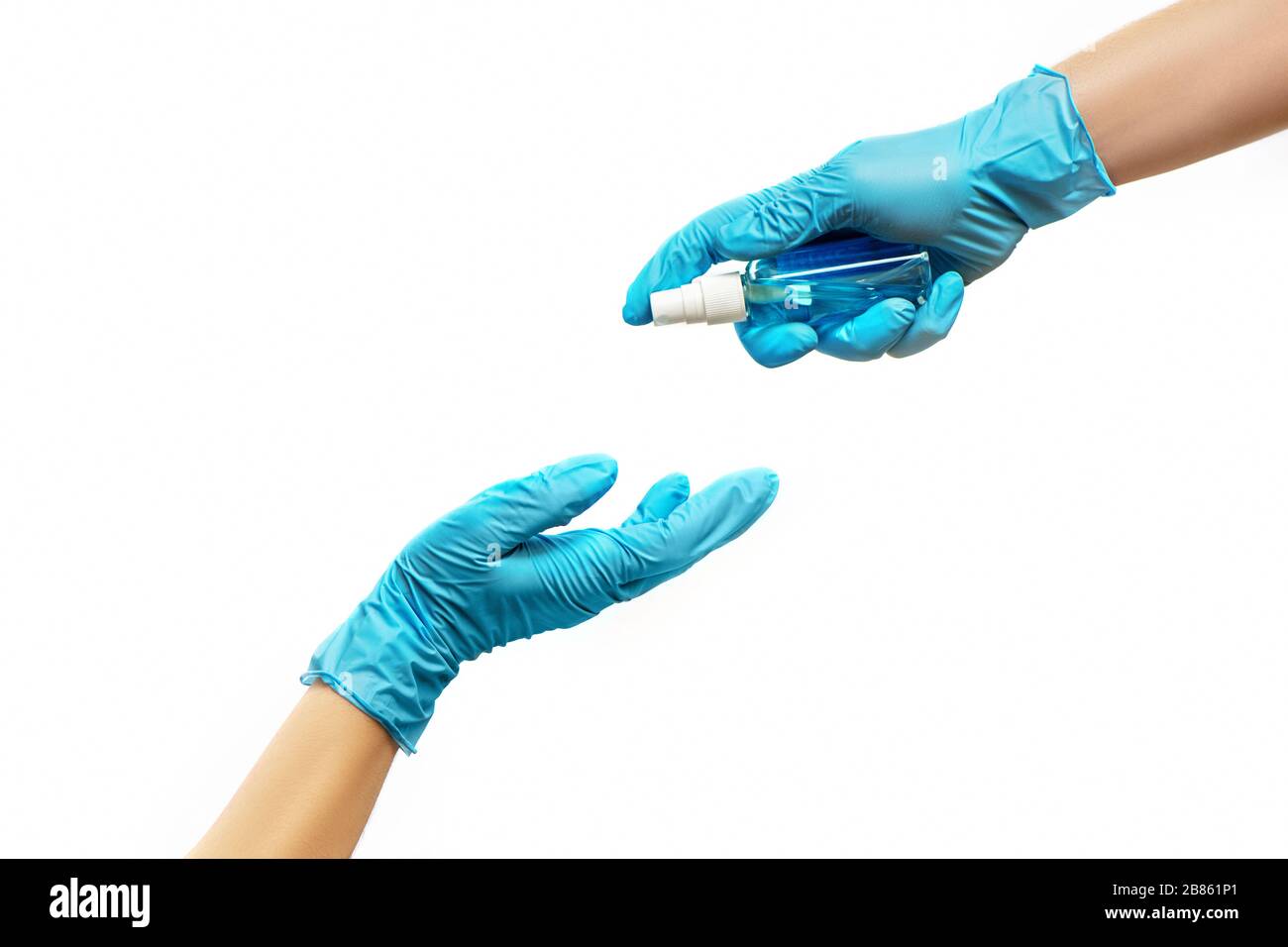 Hand in medical gloves applying sanitizer gel onto other people hands ...
